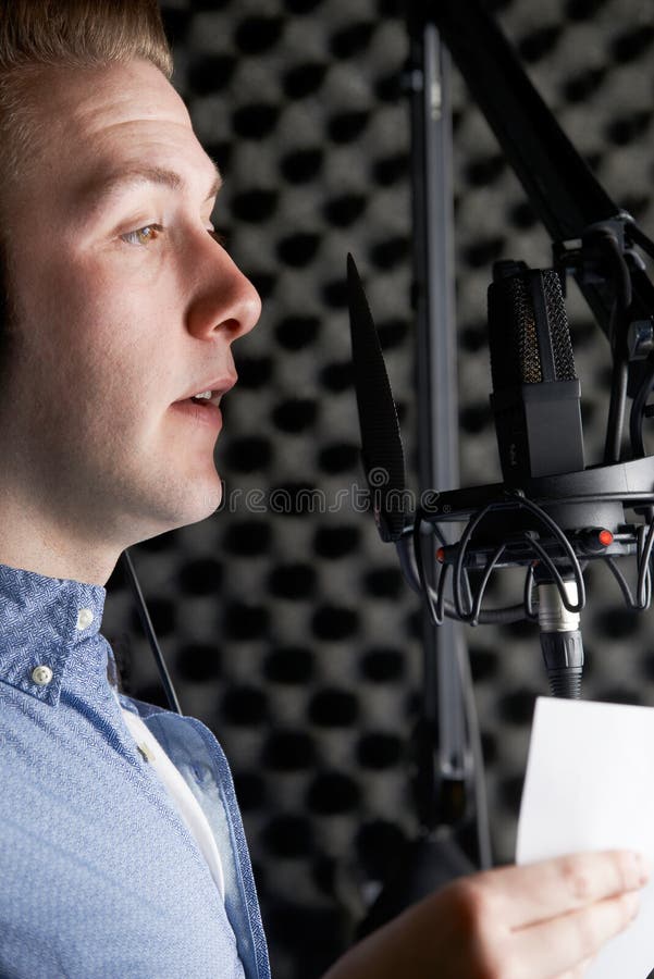 Man in Recording Studio Talking into Microphone Stock Image - Image of ...