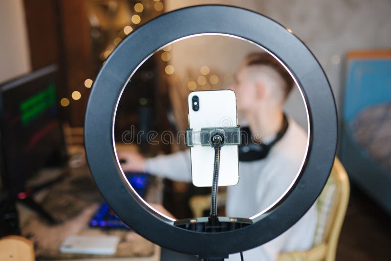 Man Recording Video on Smartphone during the Work at Home on Computer ...