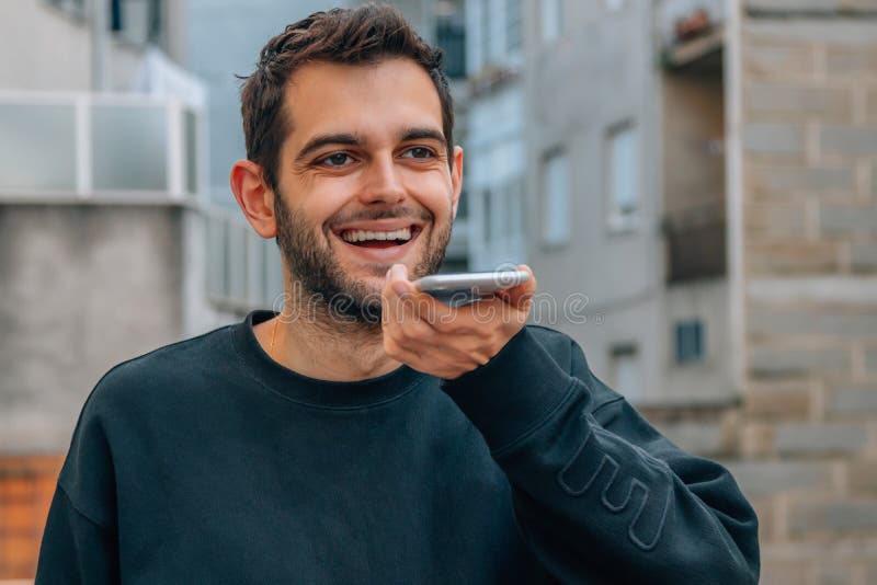 Man Recording Voice Message on Mobile Phone Stock Image - Image of ...