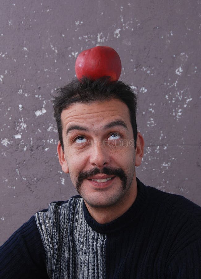 Man with Red Apple on a Head Stock Photo - Image of eyes, smile: 47127040