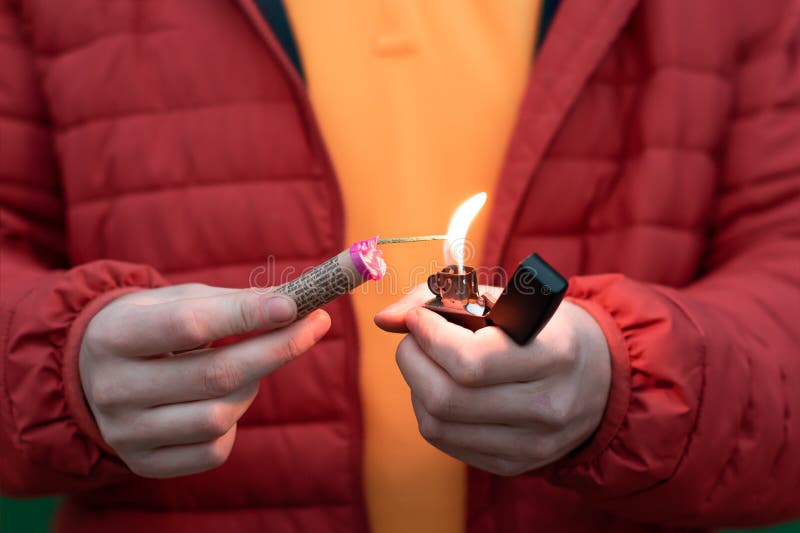 Man in Red Jacket Lighting Up Several Firecrackers Stock Photo - Image ...