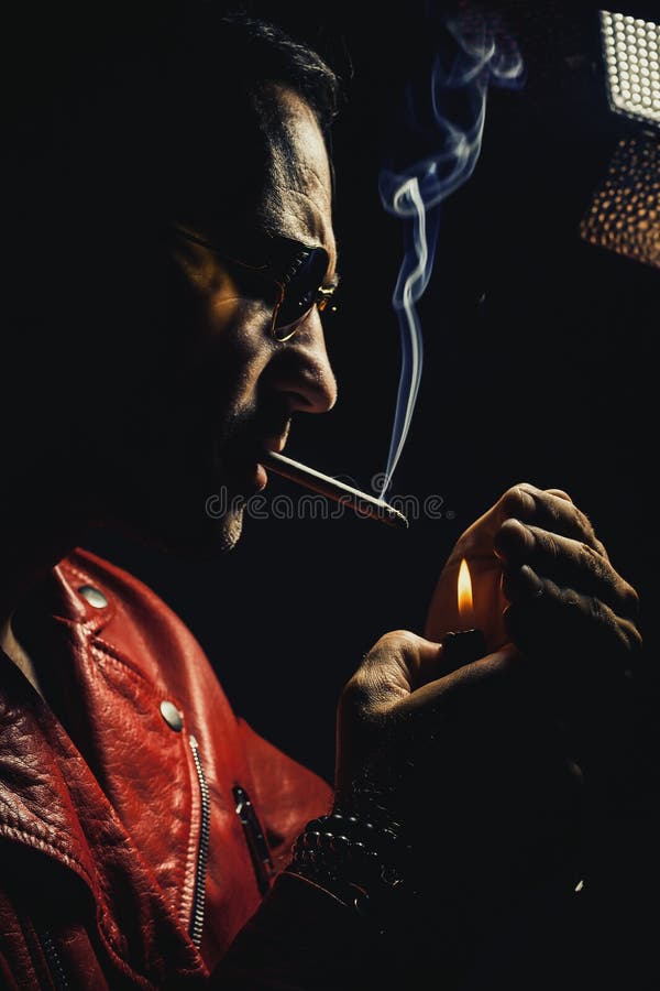 Man in Red Leather Jacket with Cigar Stock Photo - Image of face, light ...