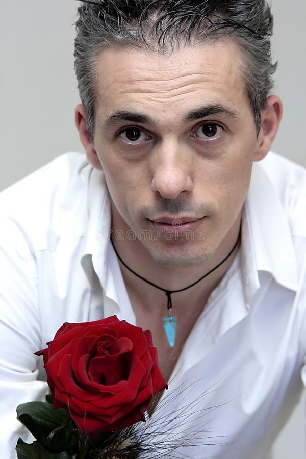 He man with the red rose stock image. Image of office - 13859939