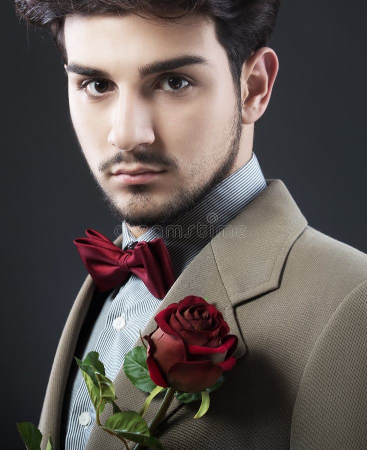 Guy with a red rose stock image. Image of declaration - 63397197