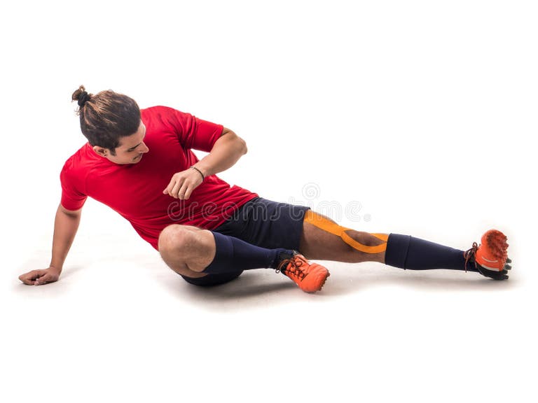 Photo of a Man Performing a Powerful Kick in a Studio Setting Stock ...