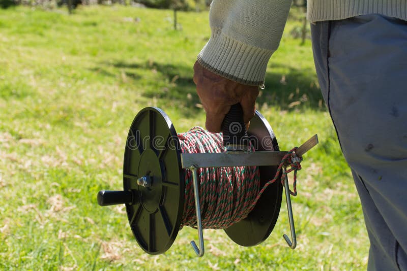 Man with Reel of Rope in His Hand Stock Photo - Image of dressmaker ...