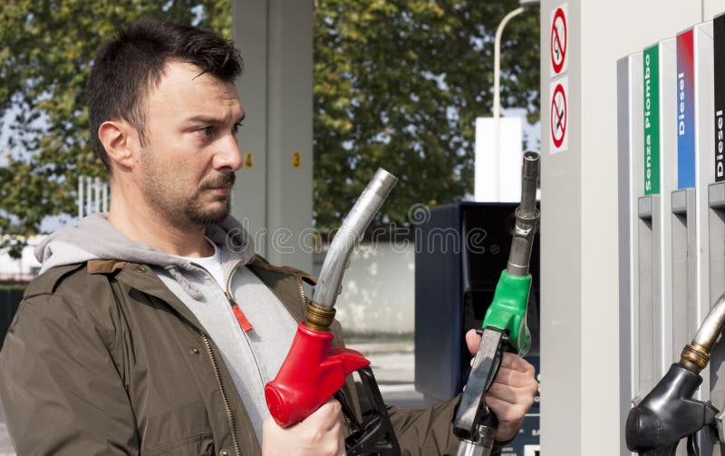 Man Refilling Car stock photo. Image of refueling, petrol - 16538894