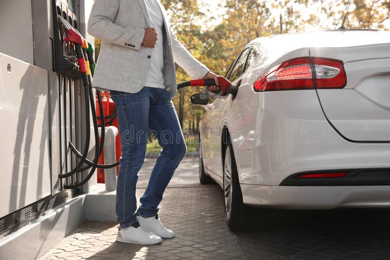 Man Refueling Car at Self Service Gas Station, Closeup Stock Image ...