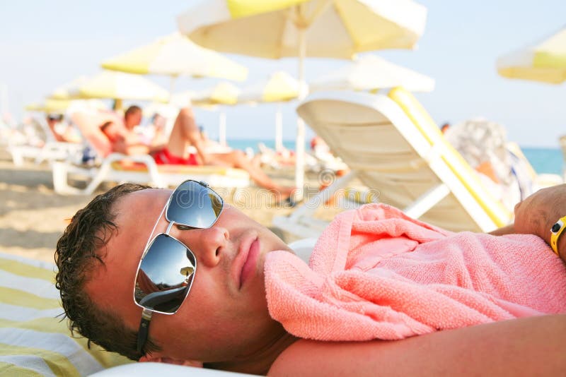 Man relax on the beach stock photo. Image of young, tranquil - 9071926