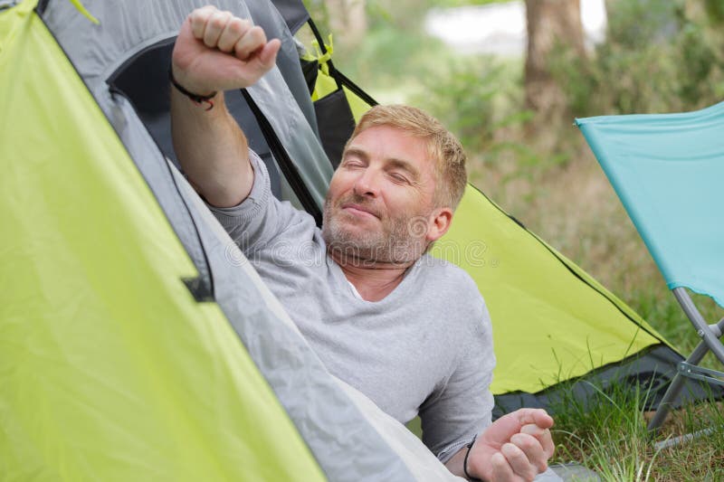 Man Relaxes during Camping Holiday Stock Photo - Image of summer ...
