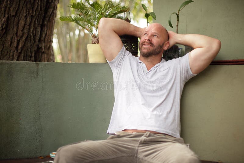 Handsome bald man outdoors stock image. Image of color - 25146371
