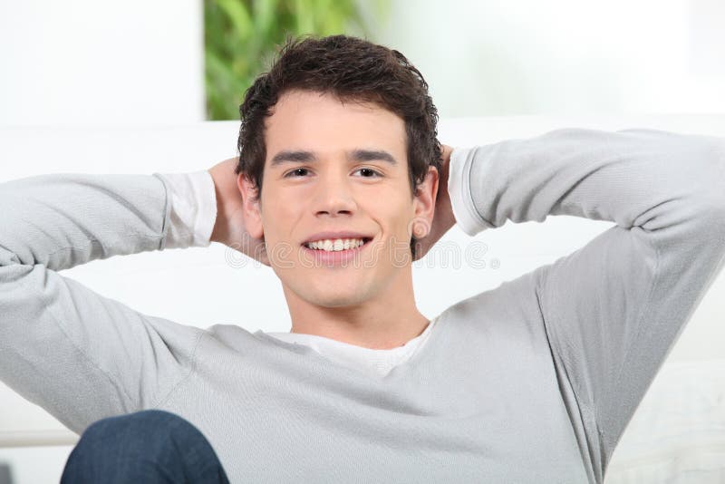 Man relaxing stock photo. Image of settle, hunk, relaxing - 27917414