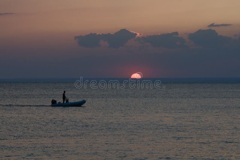 Man Relaxing on a Boat at Sunset Editorial Photography - Image of ...