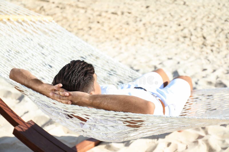Man Relaxing in Hammock on Beach. Summer Vacation Stock Photo - Image ...