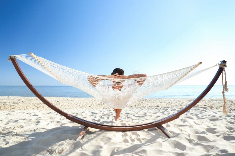 Man Relaxing in Hammock on Beach. Summer Vacation Stock Photo - Image ...