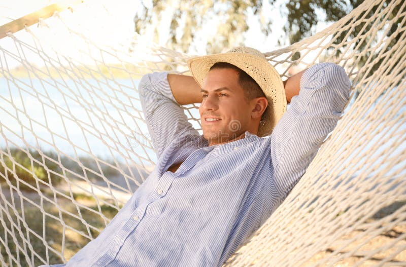 Man Relaxing in Hammock on Beach. Summer Vacation Stock Image - Image ...