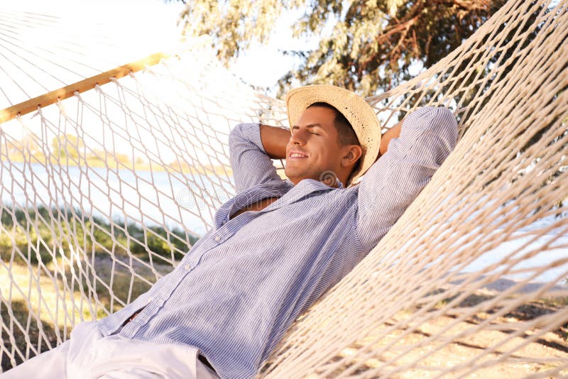 Man Relaxing in Hammock on Beach. Summer Vacation Stock Photo - Image ...