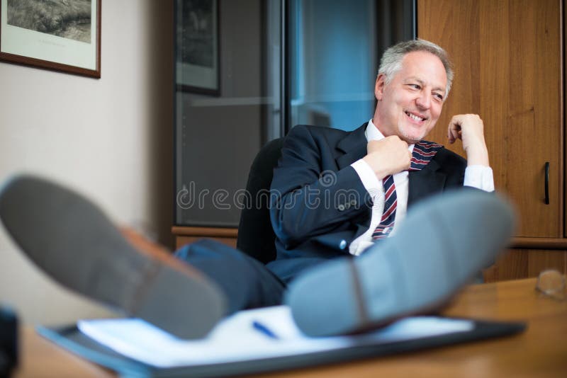 Man Relaxing in His Office after Work Stock Photo - Image of desk ...