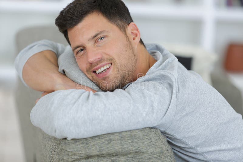 Man relaxing at home stock image. Image of lifestyle - 132216227