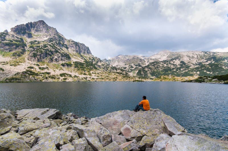 Man Relaxing on Lake stock photo. Image of blue, calm - 25740958
