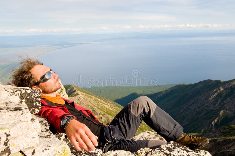 Man Relaxing at Mountain Top Stock Image - Image of lake, recreation ...