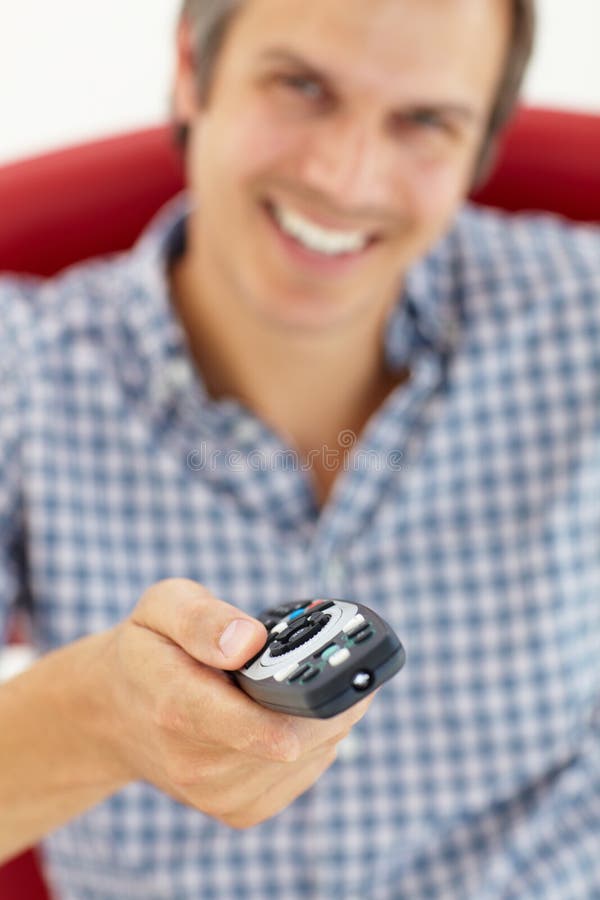 Man with remote control stock photo. Image of camera - 21288302