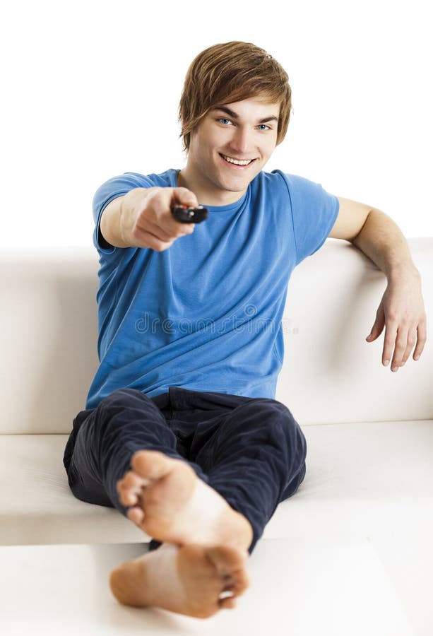 Man with a remote control stock image. Image of couch - 29846401