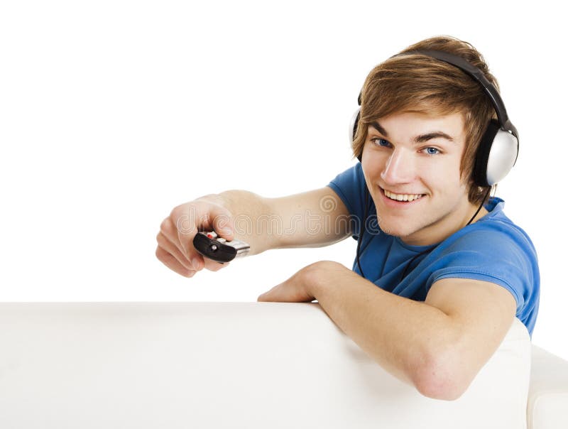 Man with a remote control stock photo. Image of headphones - 26242268