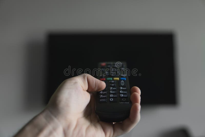 The Man with the Remote Control in Hand Want Switch on the TV and ...