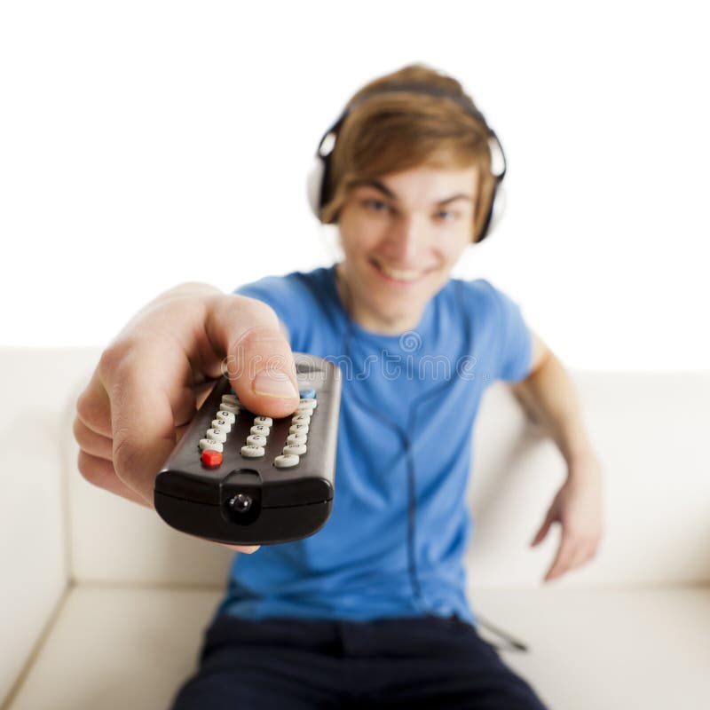 Man with a remote control stock image. Image of remote - 60675019