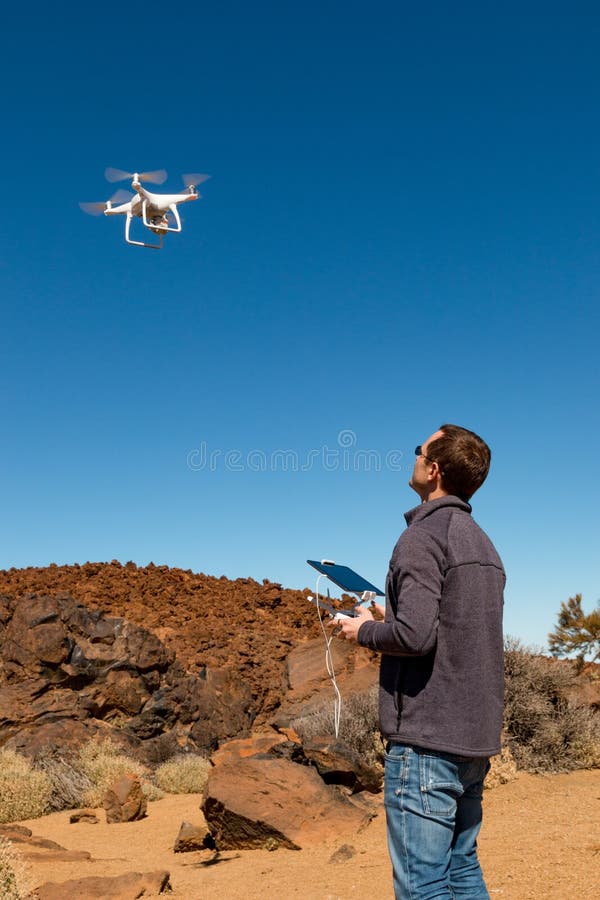 Man with Remote Controlling Drone DJI Phantom 4 in Tenerife Editorial ...