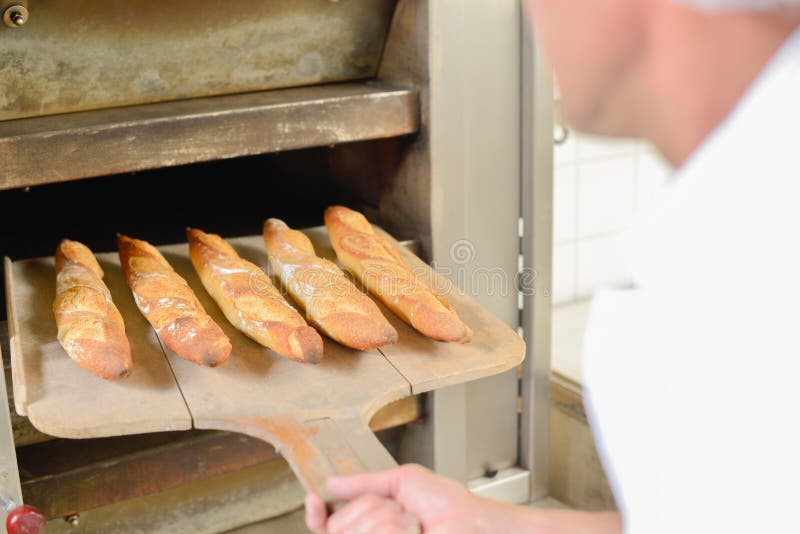 Man removing bread stock image. Image of skills, homemade - 265786595