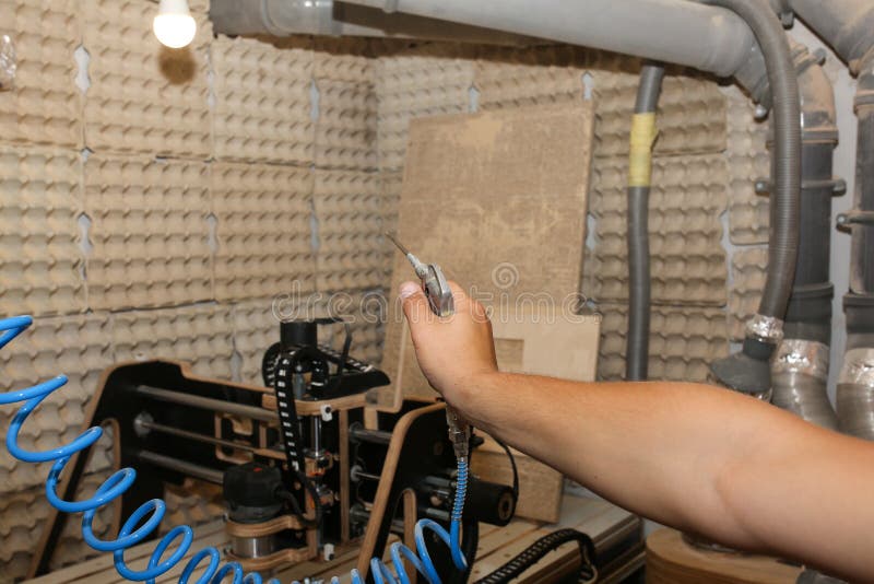 Man is Removing Dust from the Computer Numerical Control Machine for ...