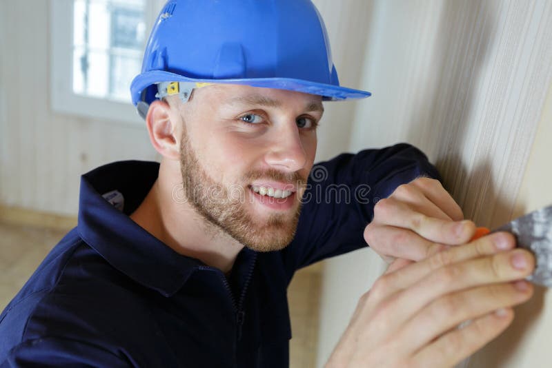Man Removing Plaster with Spatula Stock Photo - Image of craft ...