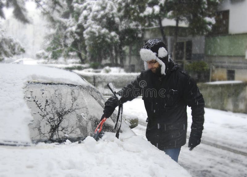 Man removing snow stock image. Image of snow, cool, male - 22978393
