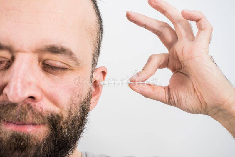 Man Removing Wax From Ear Using Q Tip Stock Image Image Of Care