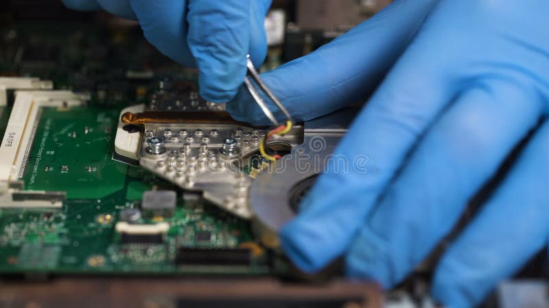 Man Repair Laptop Motherboard with Screwdriver Stock Footage - Video of ...