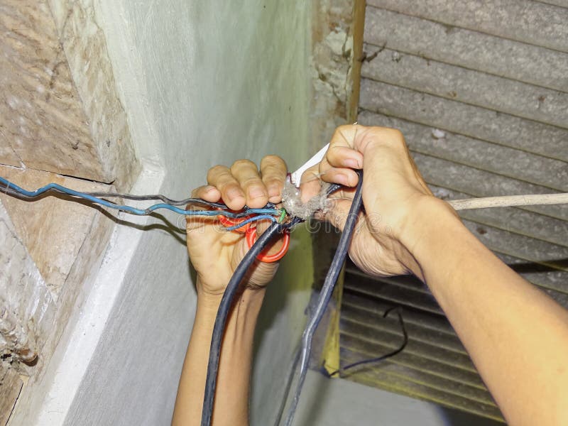 Man Repairing Broken Cable Connection Stock Image - Image of clothing ...