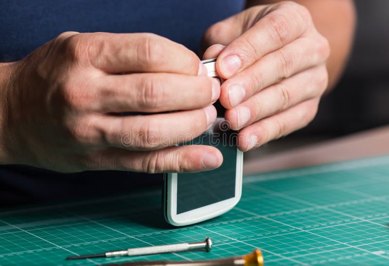 Man Repairing Broken Smartphone, Close Up Photo Stock Photo - Image of ...