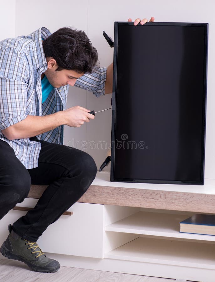 Man Repairing Broken Tv at Home Stock Photo - Image of hdmi, checking ...