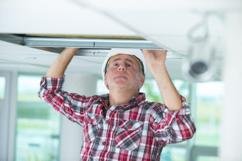 Man Repairing Collapsed Ceiling Stock Image - Image of leakage, dirt ...