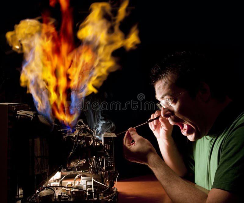 Man Repairing Computer on Fire Stock Image - Image of plug, fuse: 12884843