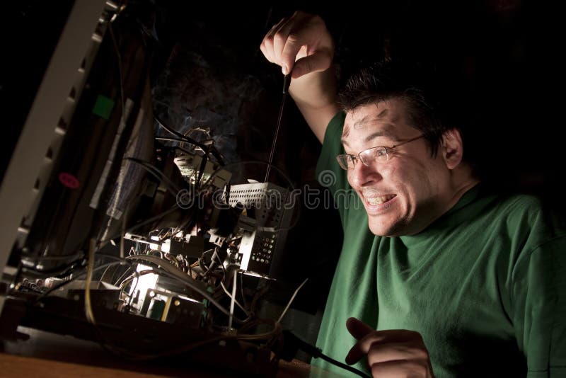 Man Repairing Computer on Fire Stock Image - Image of hazard, fire ...