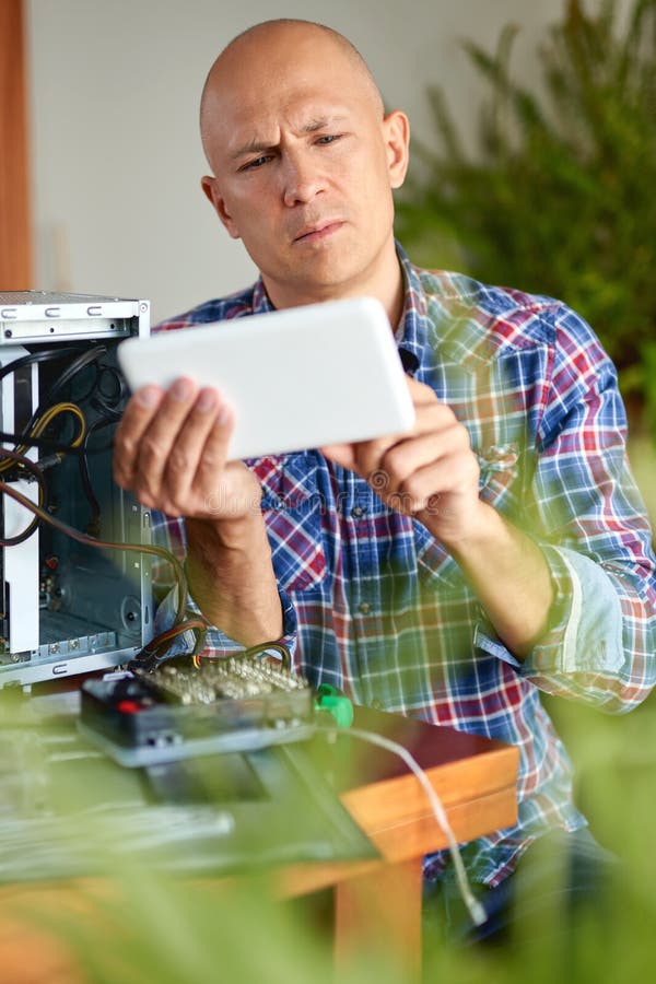 Man repairing computer stock image. Image of inside - 179534103