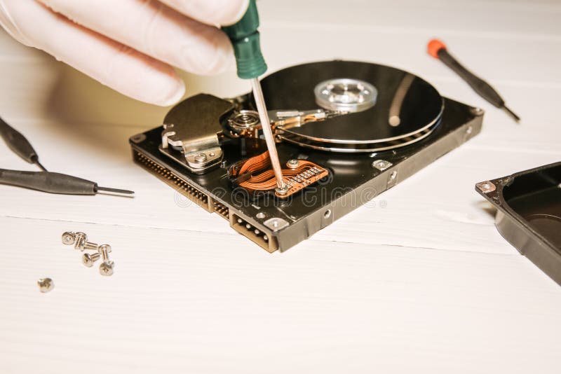 Man Repairing Hard Disk. Inside Details of the Old Personal Computer ...