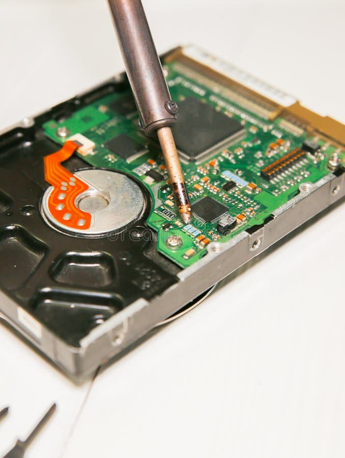 Man Repairing Hard Disk. Inside Details of the Old Personal Computer ...