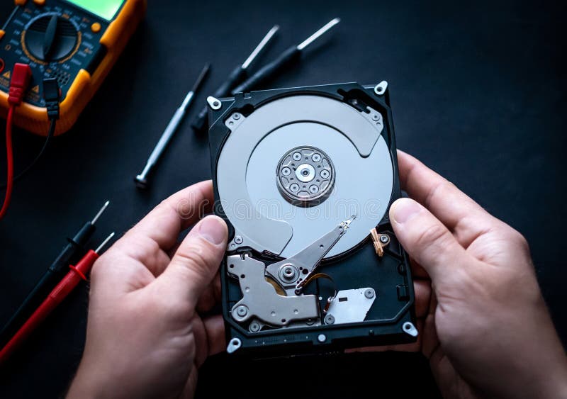 Man Repairing Hard Drive Disk Stock Photo - Image of memory ...