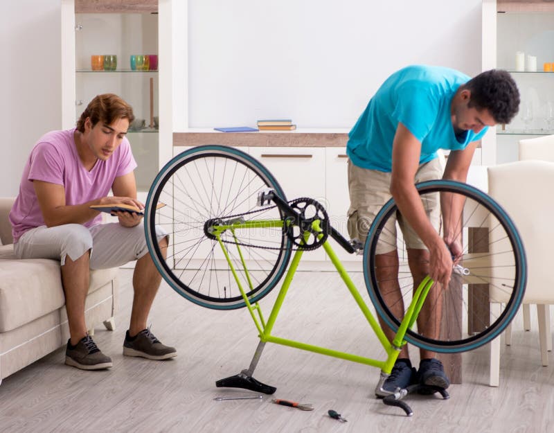 Man Repairing His Broken Bicycle Stock Image - Image of bike, mechanic ...