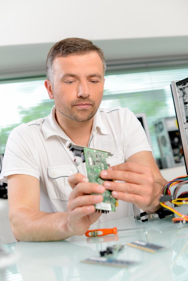Man repairing his computer stock image. Image of pieces - 119531051