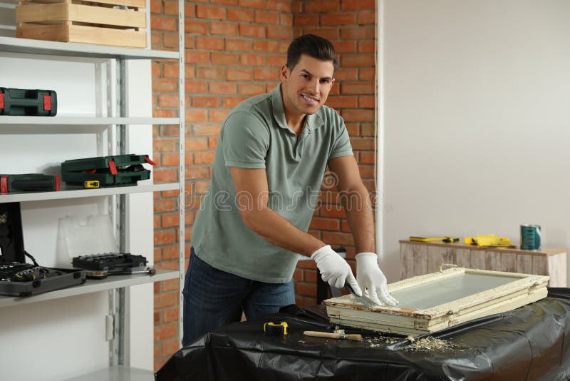 Man Repairing Old Damaged Window at Table Stock Photo - Image of gloves ...